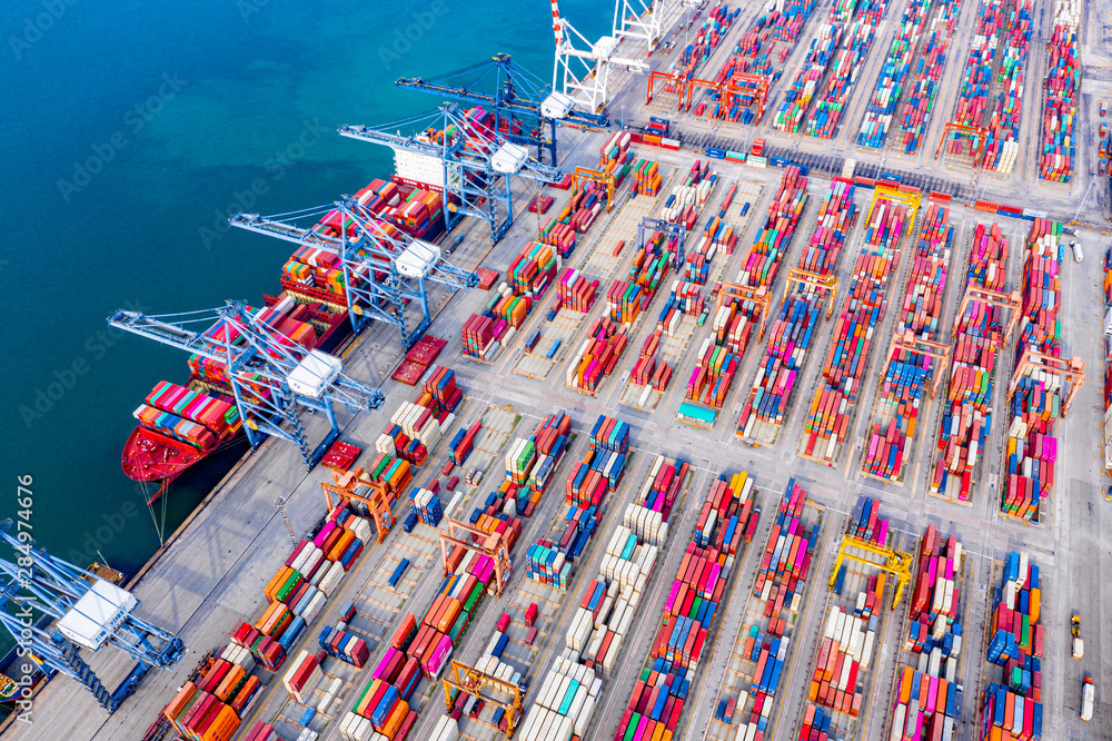Top view of Deep water port with cargo ship and containers. It is an ...