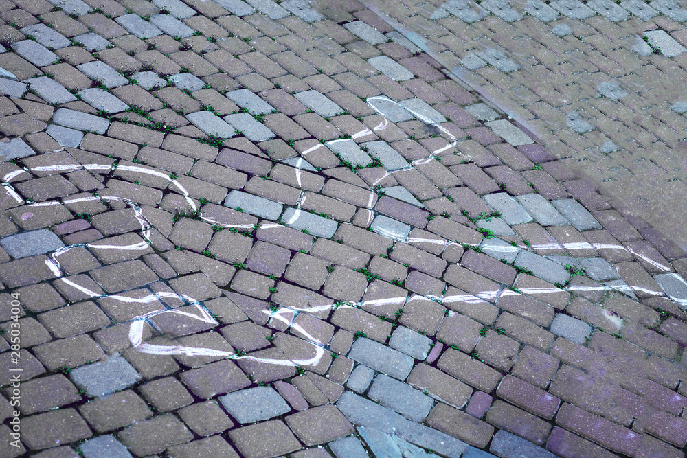 Crime scene with human body outline by chalk,drawing on the pavement ...