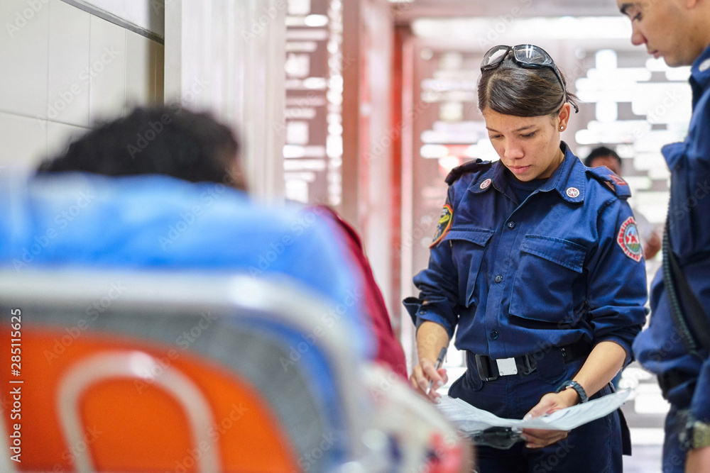 Firefighter paramedic making a report Stock Photo | Adobe Stock