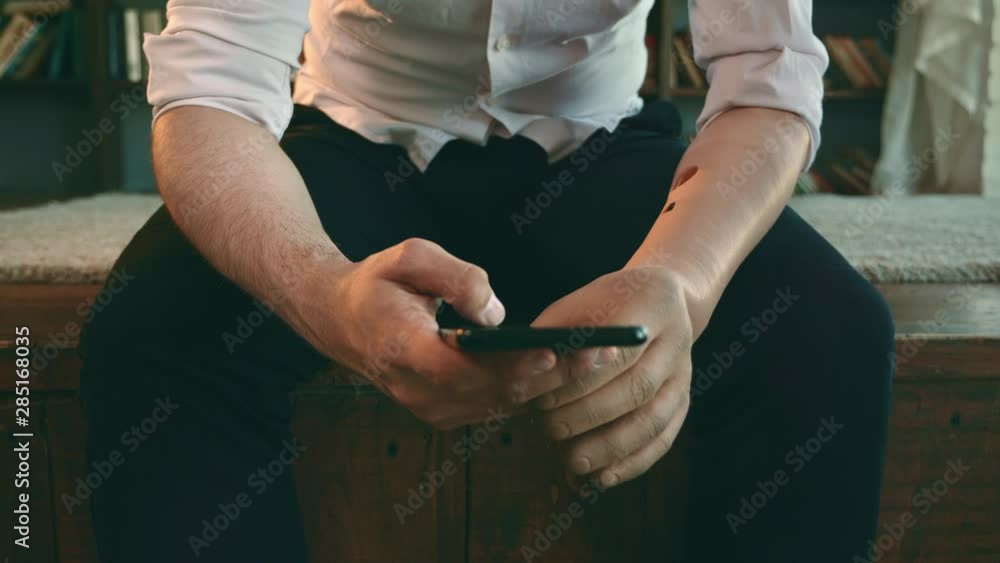 Robotic human hold smartphone with cybernetic prosthesis. Bionic robot ...