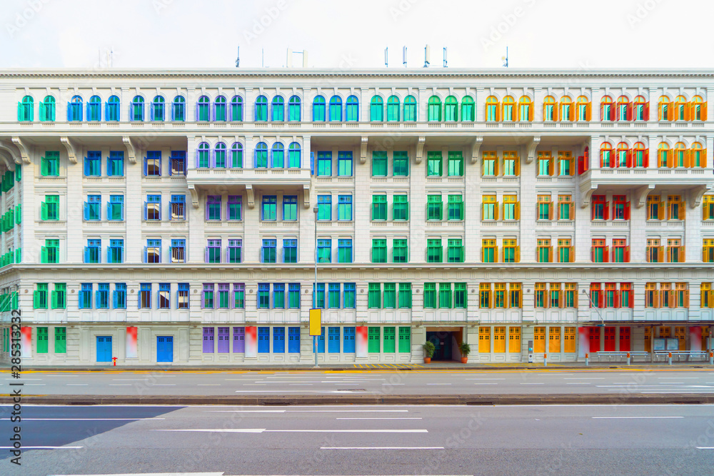 Colorful rainbow pastel building with facade windows background ...