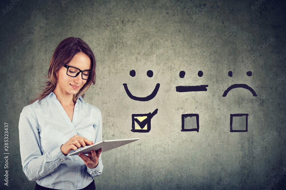 Happy business woman giving excellent rating for online satisfaction ...