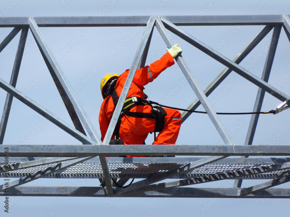 Man Working on the Working at height. Professional industrial climber ...