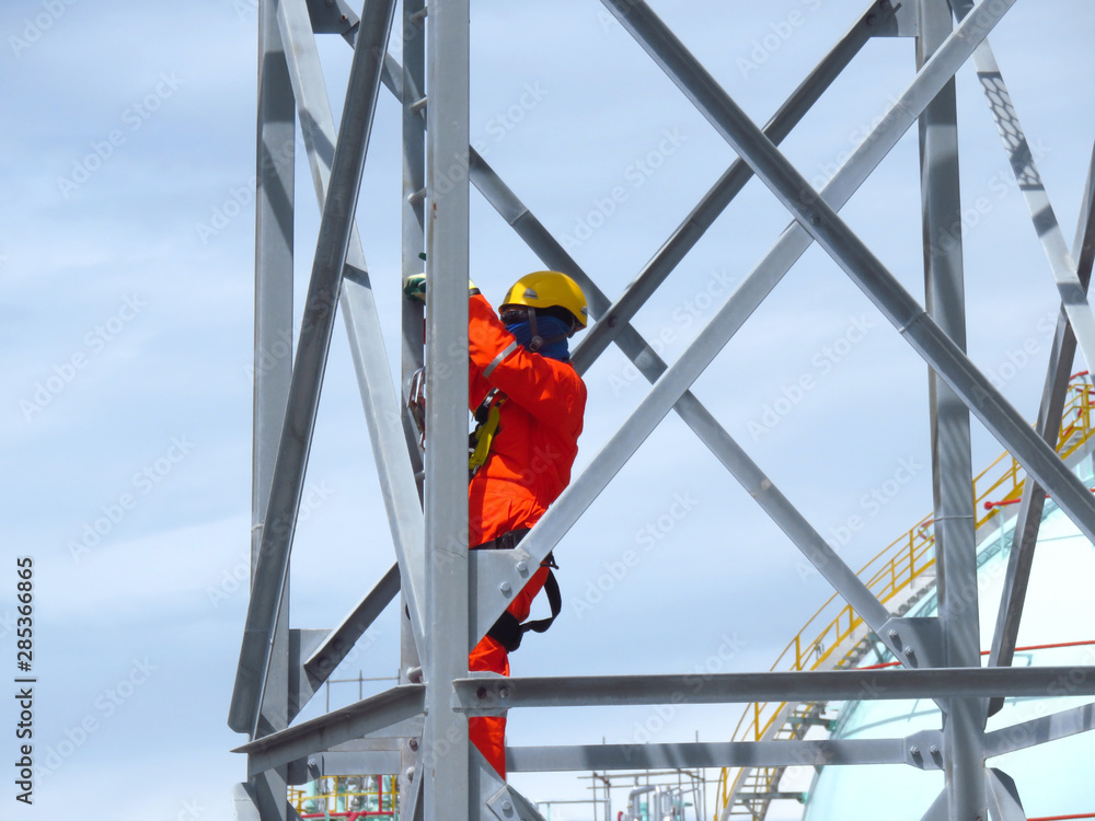 Man Working on the Working at height. Professional industrial climber ...