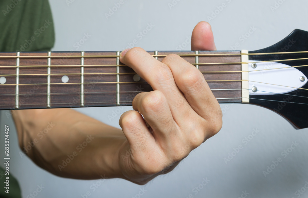 Guitar Player Hand in G Major Chord on Acoustic Guitar in Front View ...
