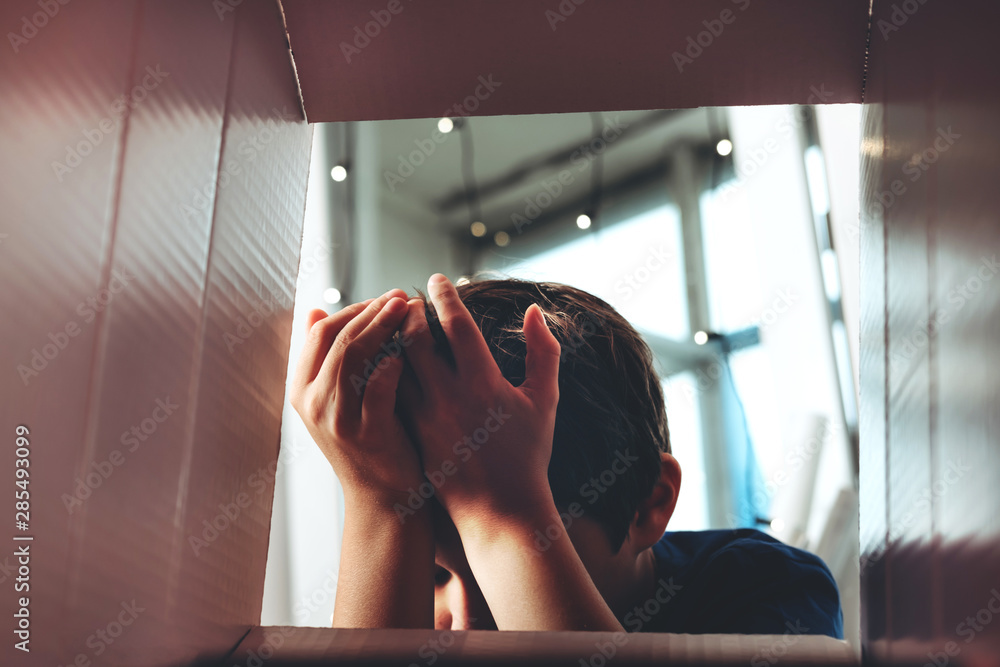 Sad little boy getting bad present. Crying child disappointed with ...