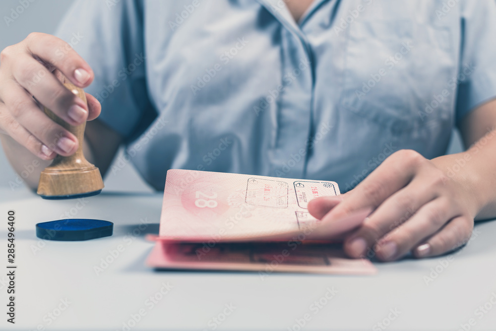 Immigration and passport control at the airport. woman border control ...
