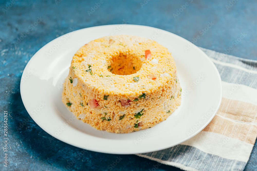 Cuscuz. Traditional Brazilian food prepared from corn flour Stock Photo ...