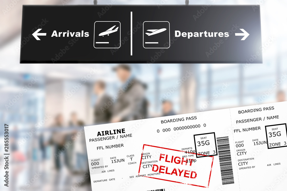 boarding pass with airline flight delayed stamp on air travel ticket ...