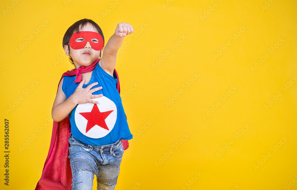 Portrait of asian little boy playing pretend to superhero. Happy young ...