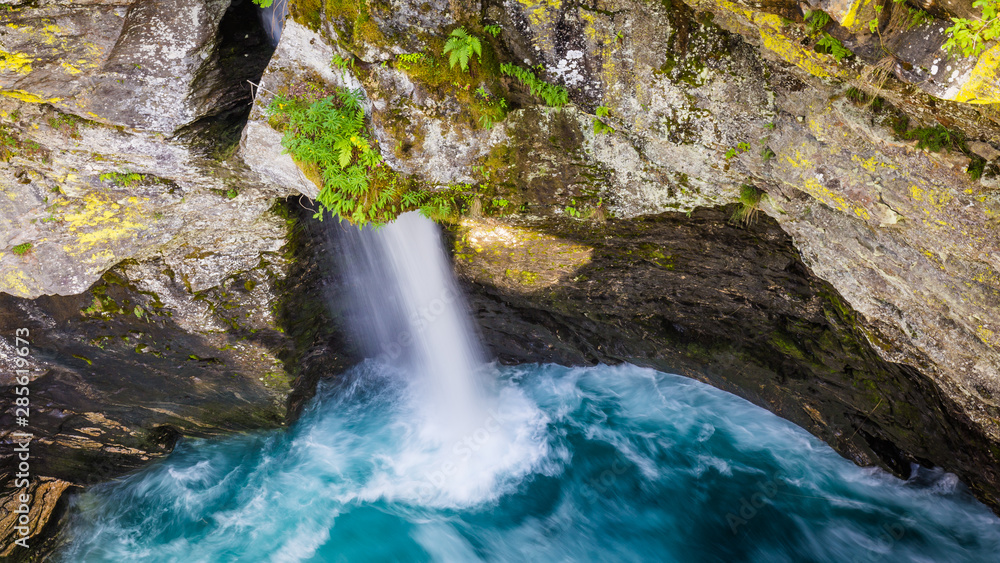 Pothole with waterfall at ravine Gudbrandsjuvet along national scenic ...