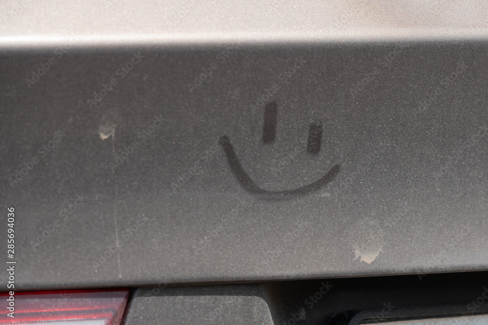 smiley face on a dirty dusty car Stock Photo | Adobe Stock