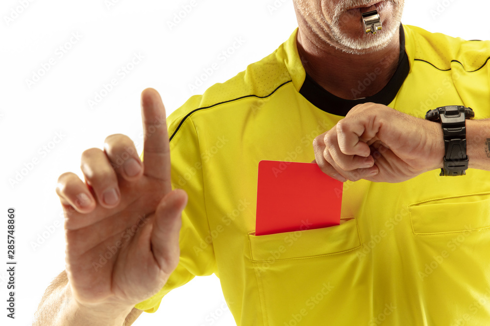 Referee showing a red card to a displeased football or soccer player ...