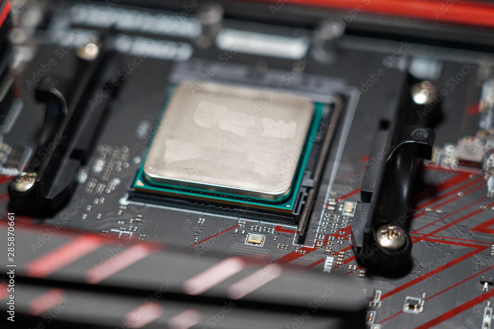 PC build - cpu on motherboard cpu socket Stock Photo | Adobe Stock
