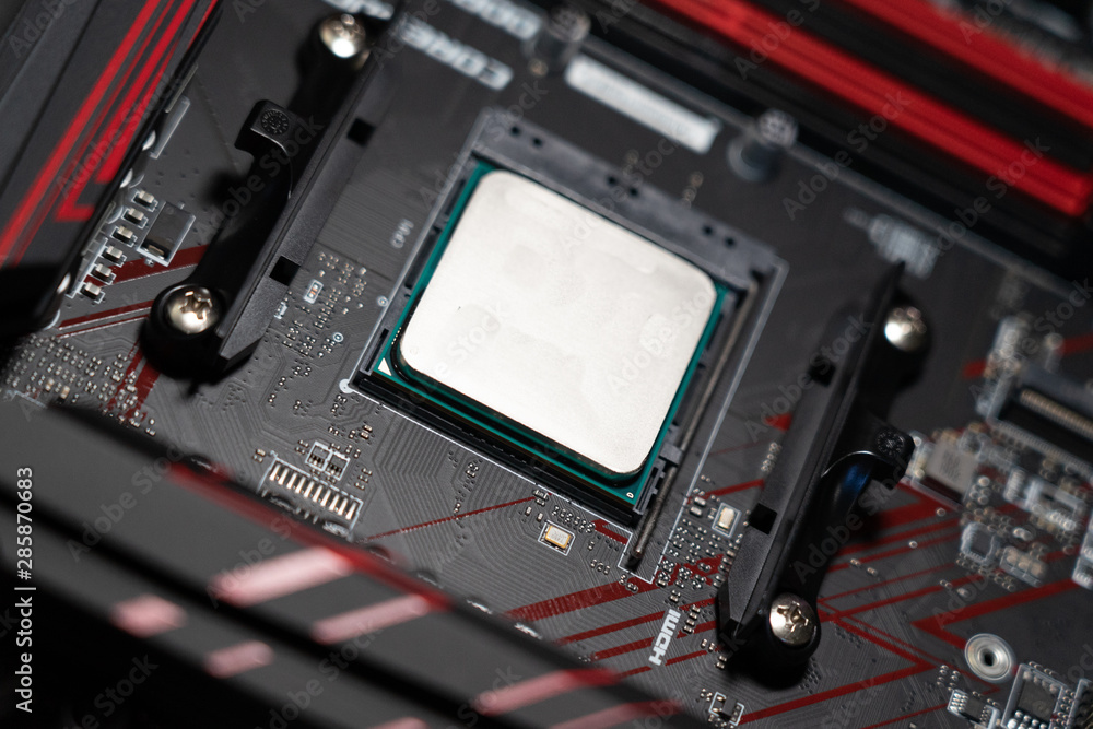 PC build - cpu on motherboard cpu socket Stock Photo | Adobe Stock