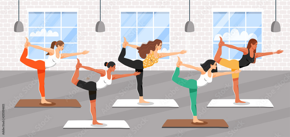 Group of young sporty women practicing yoga lesson. Girls standing in ...