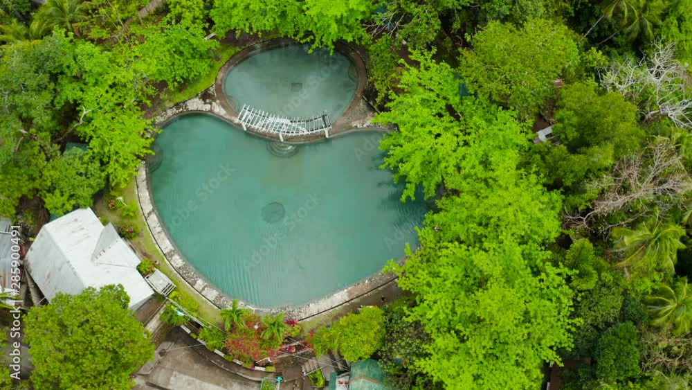 Swimming pool with spring natural soda water in the rainforest aerial ...