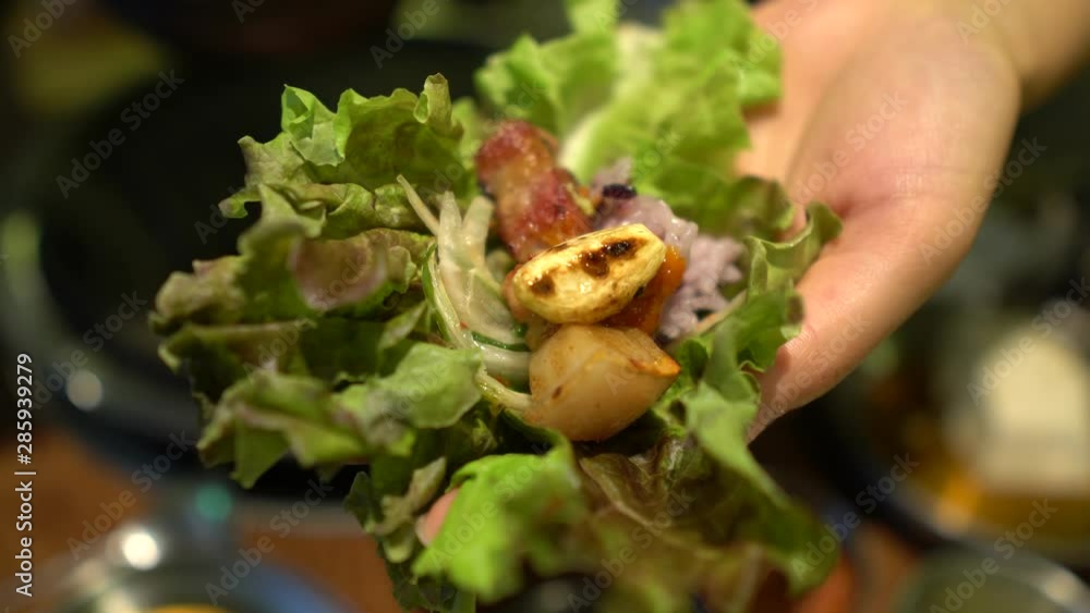 Korean bbq samgyeopsal cooked in traditional style on grill. Stock ...