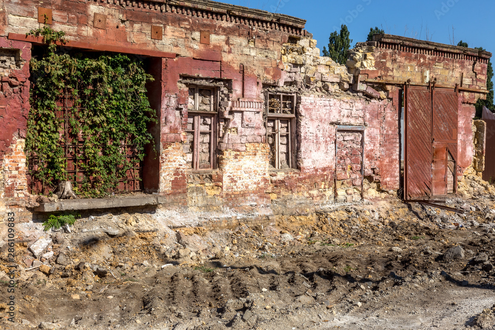 Old wall of destroyed house. Old powder wall with walled window and ...
