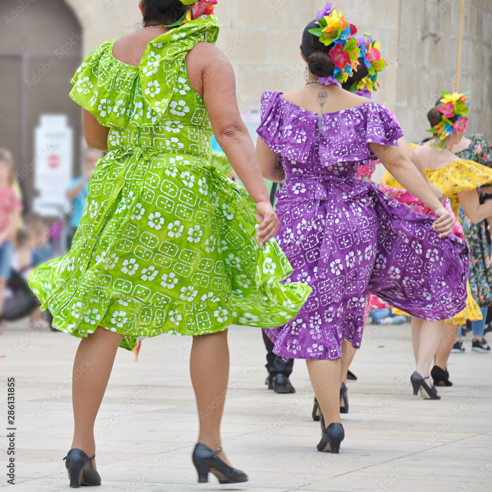 Dancers dancing and wearing one of the traditional folk costume from ...