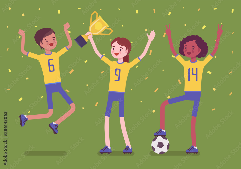 Football winner team with trophy. Young happy female athletes in ...