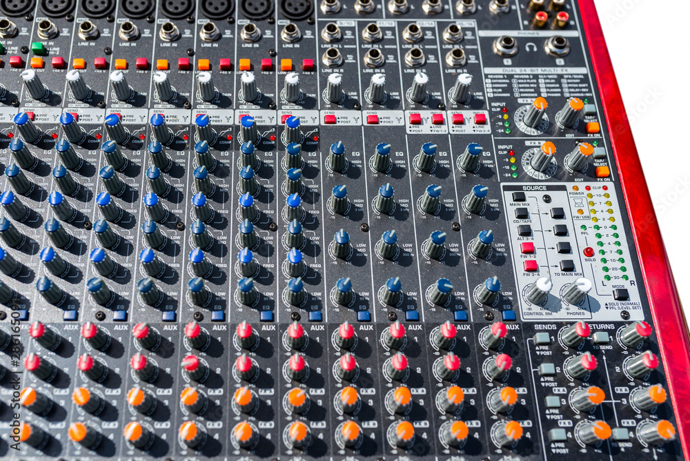 Close up photo of a professional sound mixer with many adjustments ...