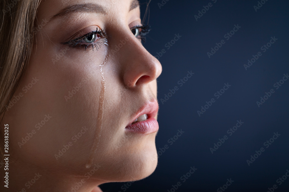 tears on woman face, beauty girl cry on black background Stock Photo ...