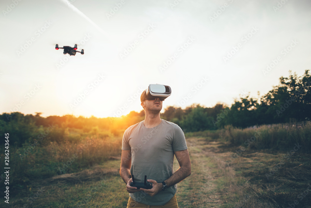 Drone pilot using drone with remote controller and virtual reality ...
