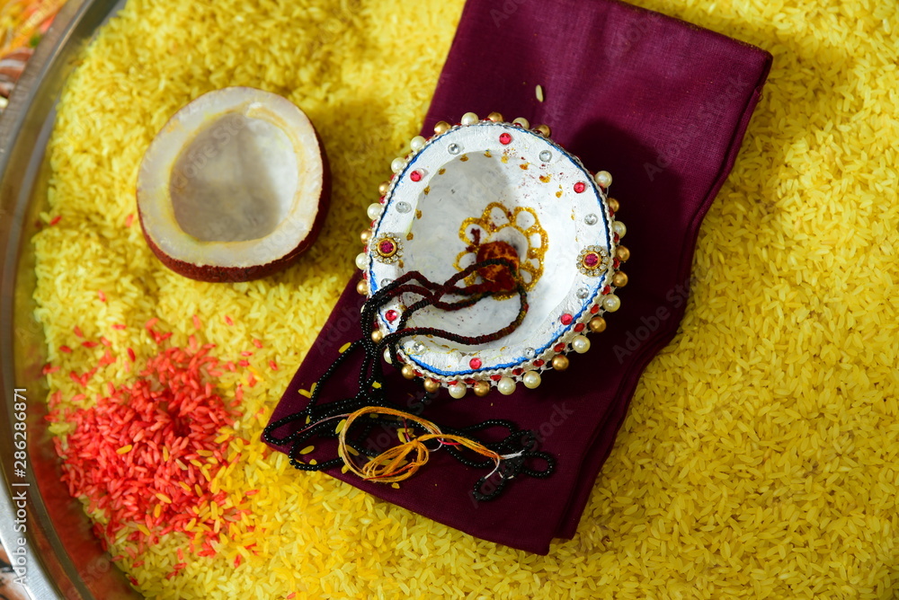indian tradition wedding thread with rice Stock Photo | Adobe Stock
