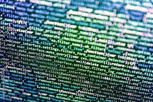 HTML CSS3 source code on lcd screen with black background. Programming code abstract background ...