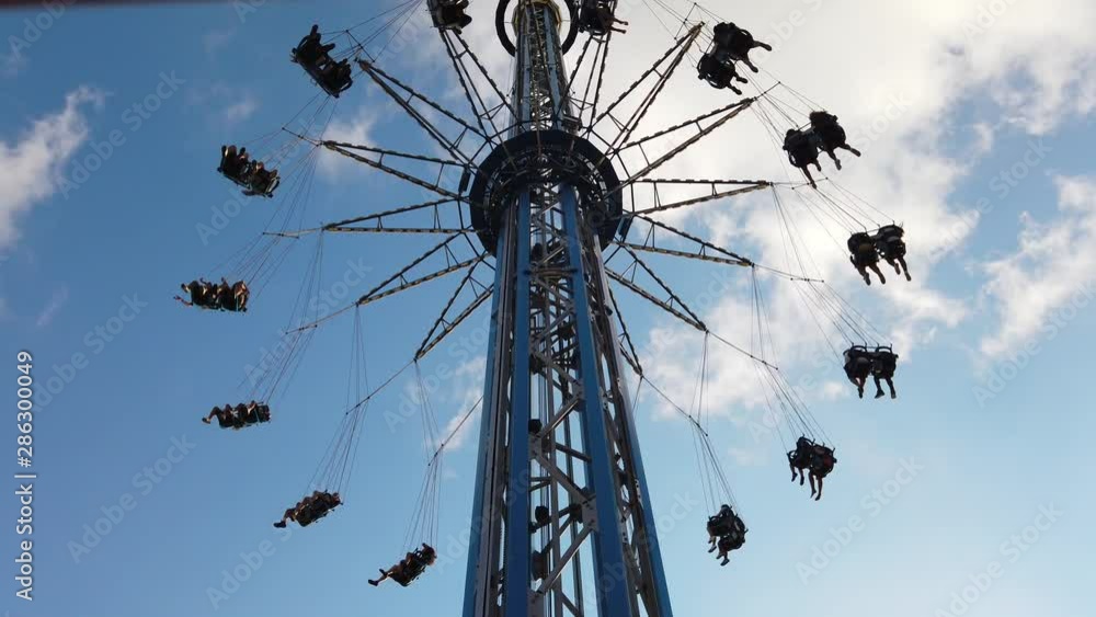 Rotating gondola mounted on a central tower Stock Video | Adobe Stock
