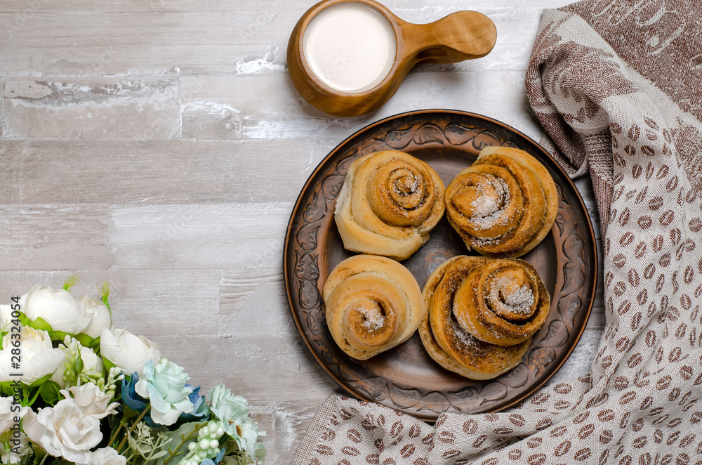 homemade baked pasties with cabbage and sweet buns with sugar and ...