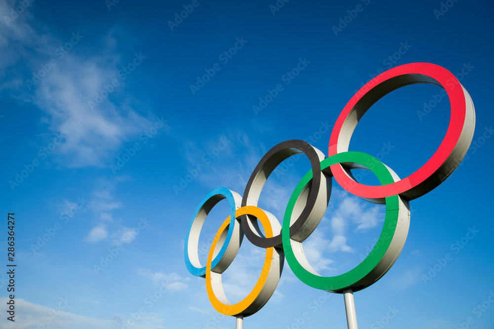 RIO DE JANEIRO - MARCH 18, 2016: A large set of Olympic rings shines in ...