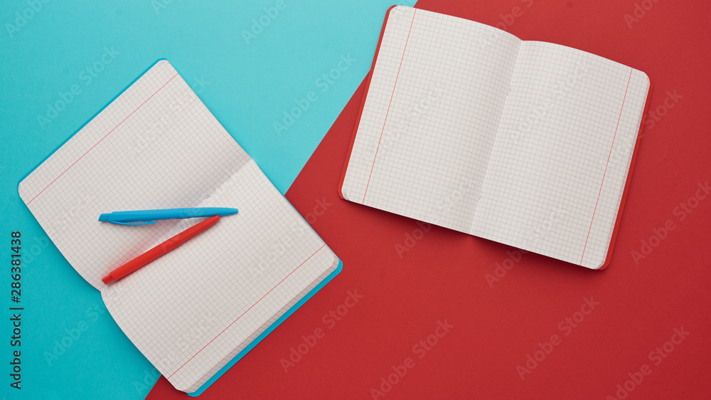 notebook on a red and blue background, back to school, student ...