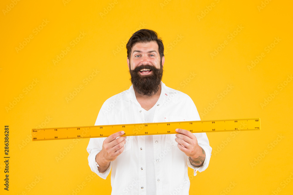 There is no substitute for a great teacher. Happy teacher holding ruler ...