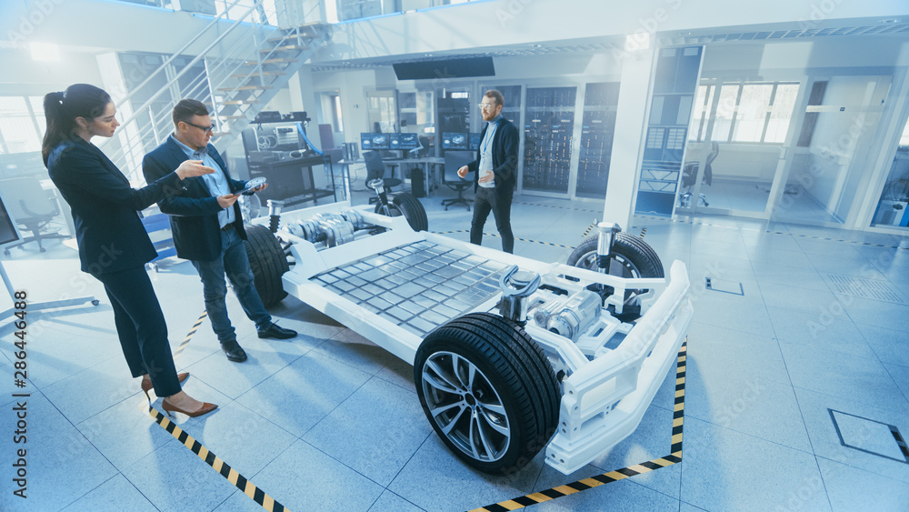 Automotive Design Engineer Shows the Electric Car Chassis Prototype to ...