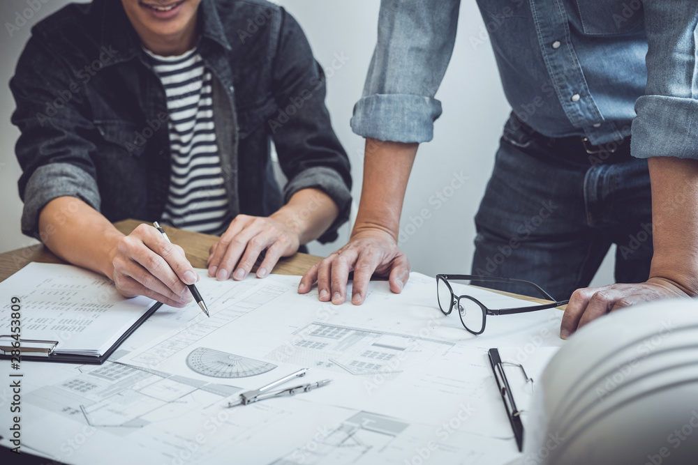 Architecture Engineer Teamwork Meeting, Drawing and working for ...