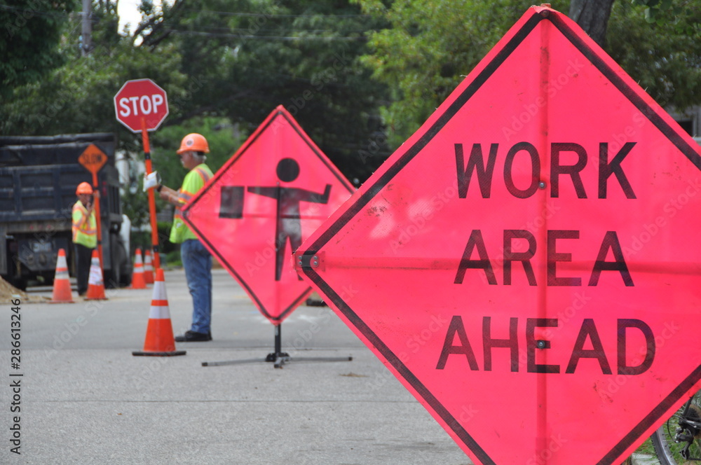 Construction Work Sign, Flaggers and Cones Stock Photo | Adobe Stock
