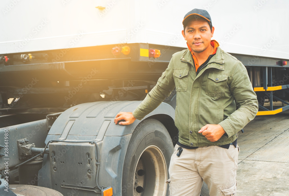 Portrait of asian truck driver with semi truck trailer. Lorry truck ...