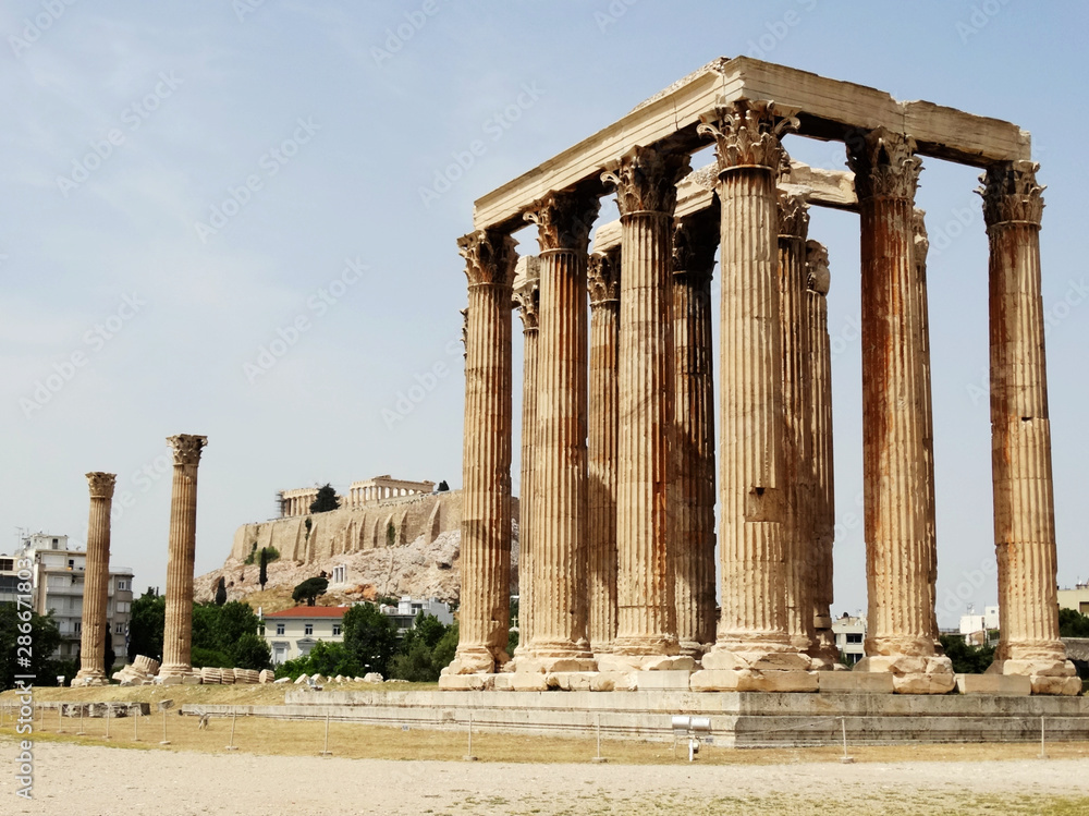 Temple of Olympian Zeus in Athens in Greece with The Parthenon Temple ...
