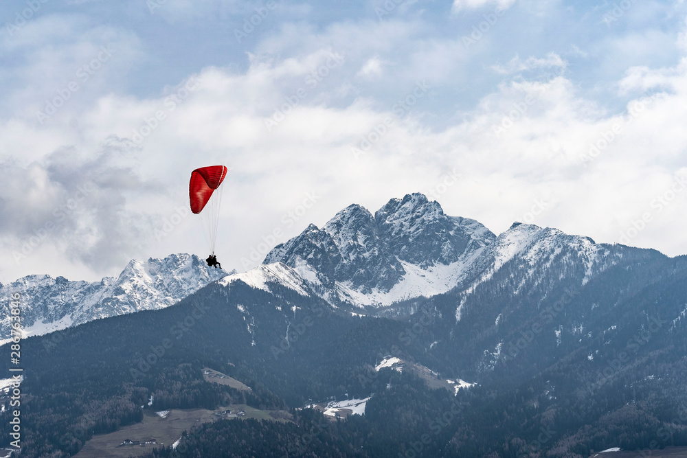 Two people flying with a Tandem and enjoying the freedom, high up in ...
