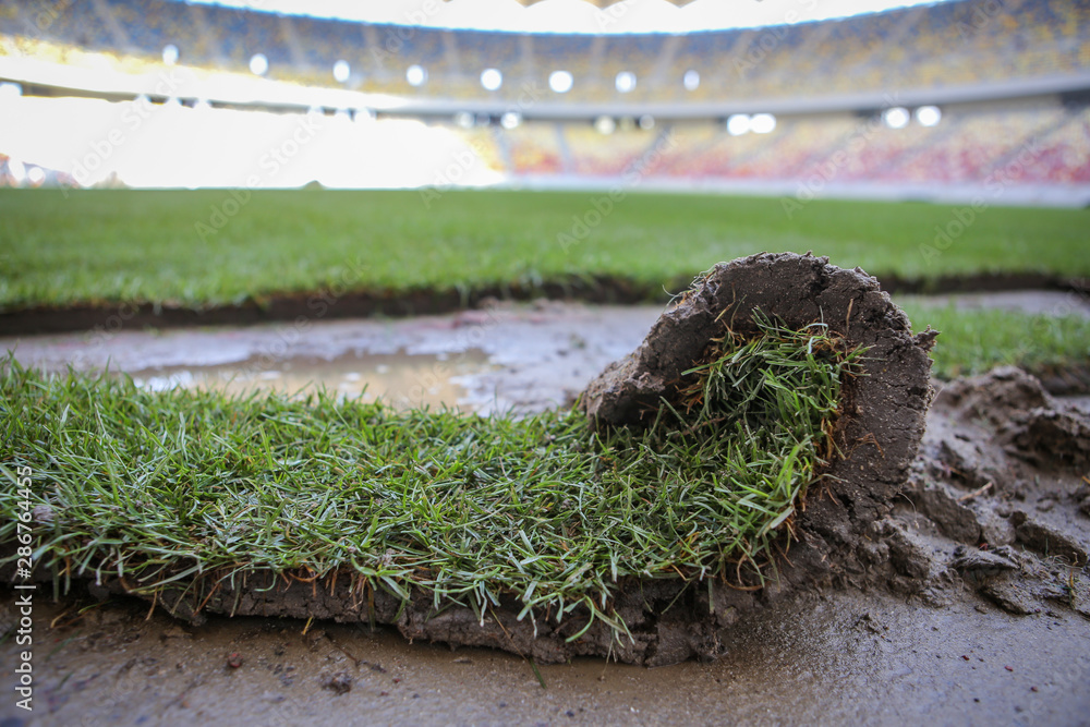 Details with the freshly installed and trimmed new turf on a soccer ...