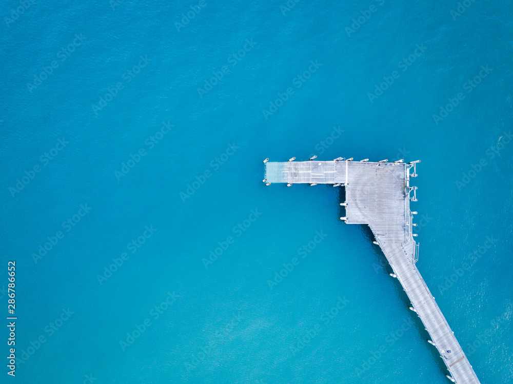 Jetty in blue water off Fraser Island, Queensland, Australia Stock ...