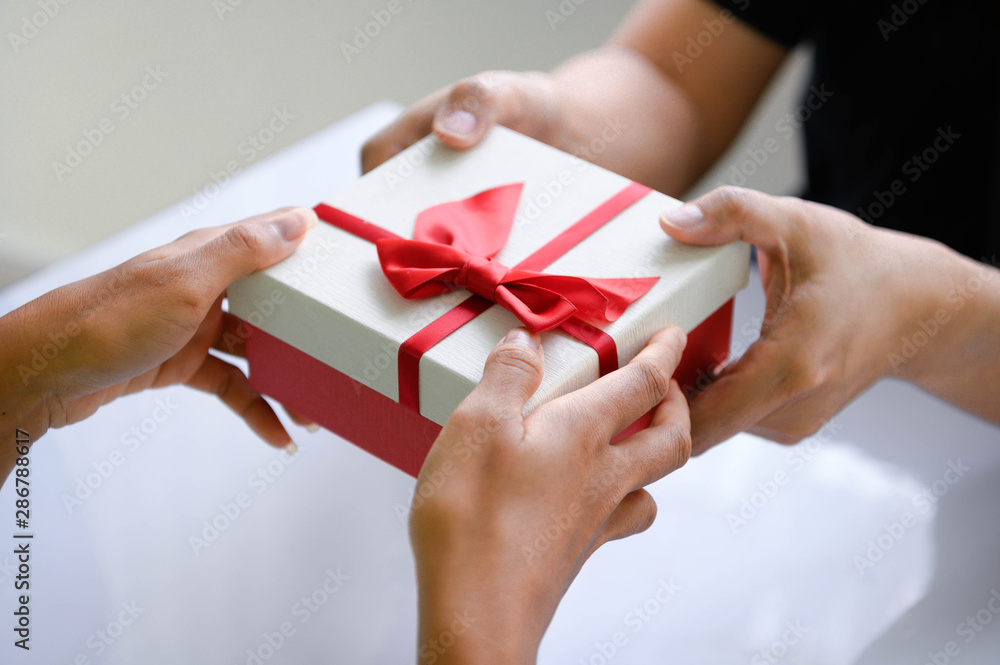 People Giving Gifts