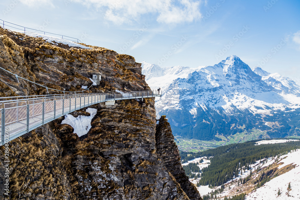 Traveller is photograph imageon sky cliff walk at First peak of Alps ...