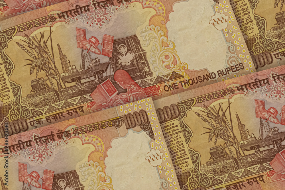 Indian rupees banknotes background. 1000 INR Stock Photo | Adobe Stock