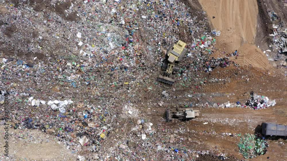 Top down aerial footage of a Municipal Solid waste Landfill during ...