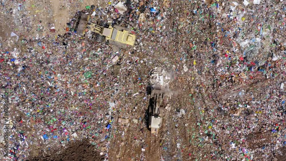 Top down aerial footage of a Municipal Solid waste Landfill during ...