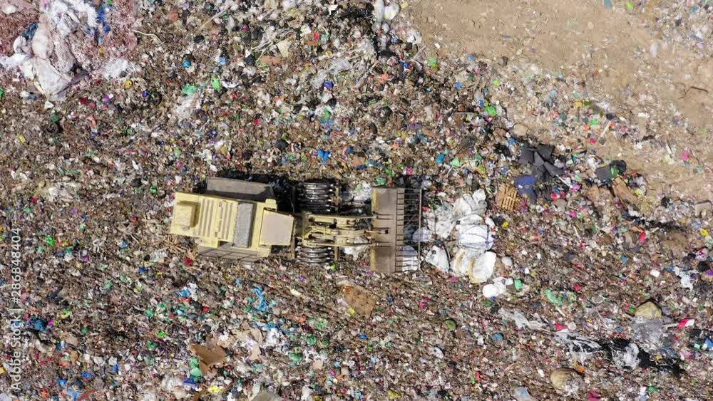 Top down aerial footage of a Municipal Solid waste Landfill during ...