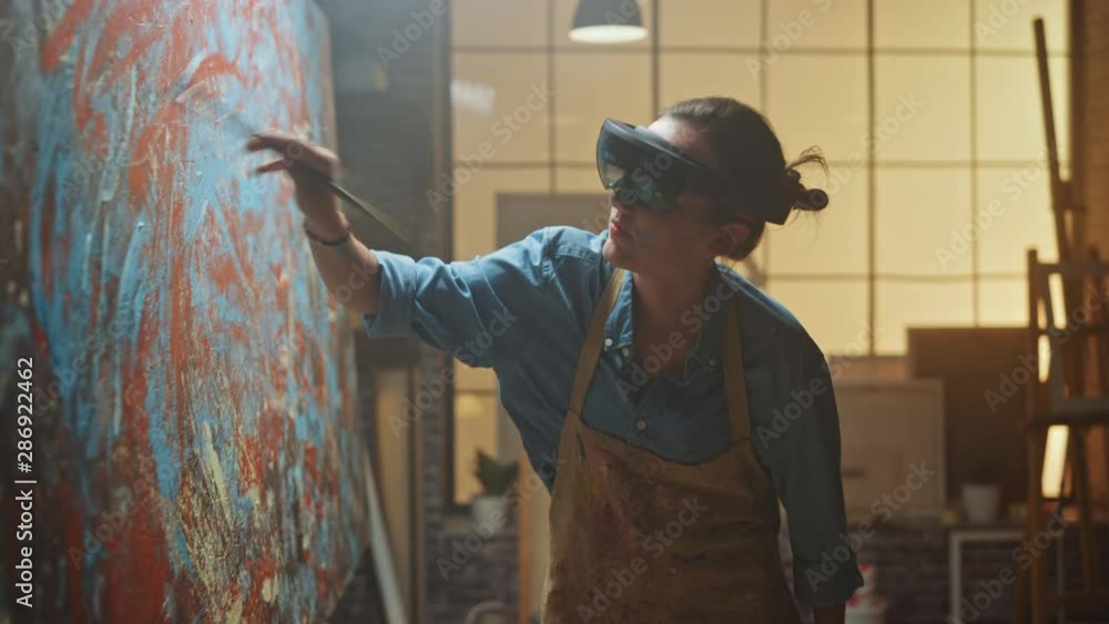 Talented Female Artist Wearing Augmented Reality Headset Working on ...